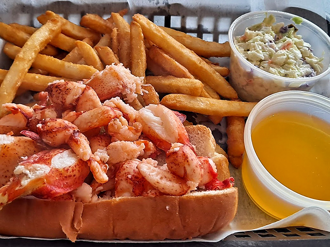 A proper Maine lobster roll doesn't need fancy frills - just sweet meat, a toasted bun, and enough to make you smile.