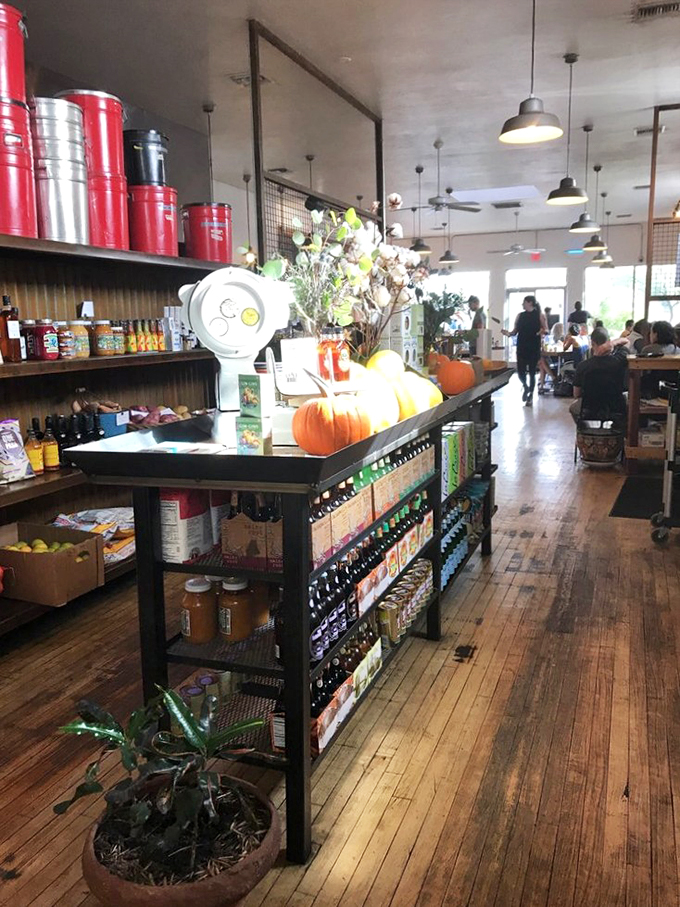 From pumpkins to pantry staples, this market corner feels like stepping into your favorite neighbor's exceptionally well-stocked kitchen.