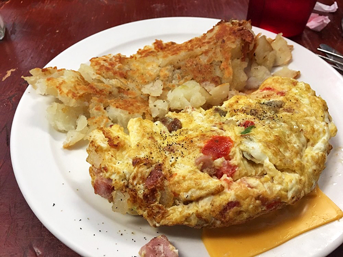 The perfect marriage of crispy and creamy. This omelet and home fries combo is the breakfast equivalent of Fred Astaire and Ginger Rogers.