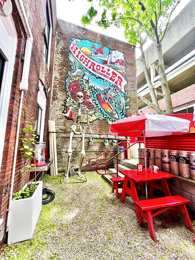 A whimsical skeleton keeps watch over the outdoor patio, while a vibrant mural turns brick walls into seaside storytelling.