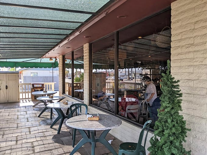 Al fresco dining with a side of British charm. Who knew you could get a tan while sipping on a proper pint?