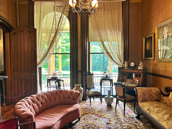 Sunlight streams through lace curtains onto period furnishings, creating the perfect setting for your imaginary Victorian novel.