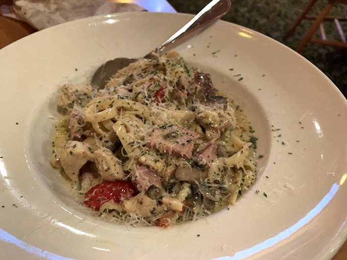 Creamy pasta perfection meets fresh seafood in a dish that would make Neptune himself ask for seconds. Photo credit: Danni Z.