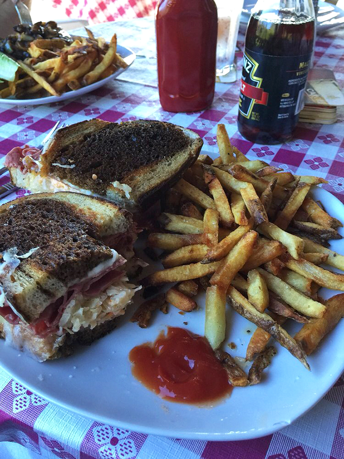 The classic Reuben comes with crispy hand-cut fries and house-made coleslaw, a trio that'll make your taste buds dance. Photo credit: Karen S.