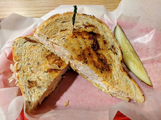 Golden-toasted bread cradles a generous helping of turkey, creating the kind of sandwich that makes lunch the day's main event.