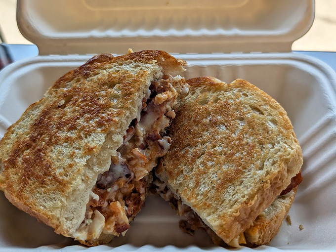 This sandwich isn't just grilled &ndash; it's been kissed by the gods of melted cheese and perfectly toasted bread.