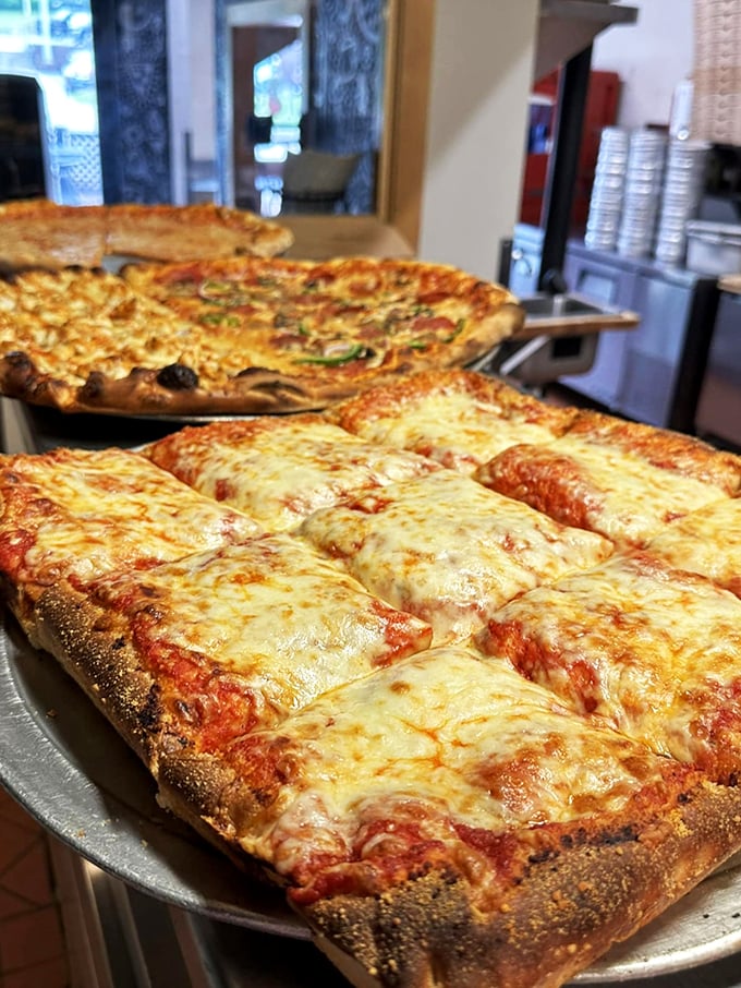 Sicilian pizza: where the crust is thick, the cheese is abundant, and your diet plans go to die. But oh, what a delicious way to go!