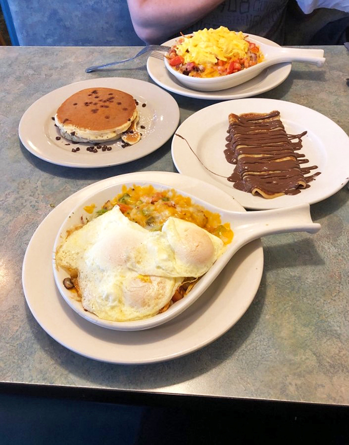 A breakfast spread that makes decisions difficult: chocolate-drizzled pancakes, hearty skillets, and more compete for your attention.
