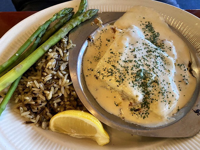 This isn't just stuffed haddock &ndash; it's a cloud of seafood perfection floating in a sea of heavenly cream sauce. Photo credit: Risa H.