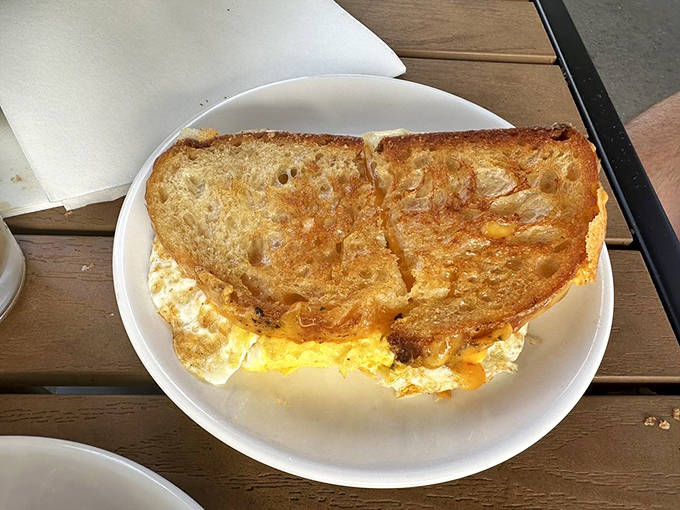 Golden-brown perfection meets melty cheese in a breakfast sandwich that puts your regular drive-thru to shame.