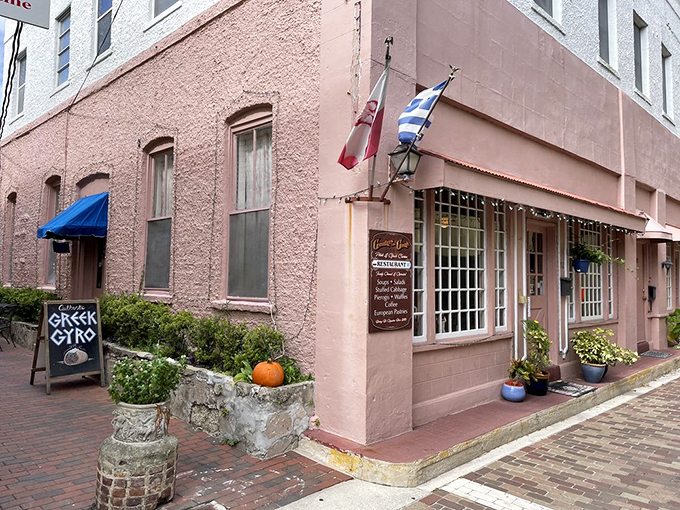 Who needs a red carpet when you've got a pink building? This restaurant entrance is more inviting than a warm hug from your favorite aunt. Photo credit: Reid S.