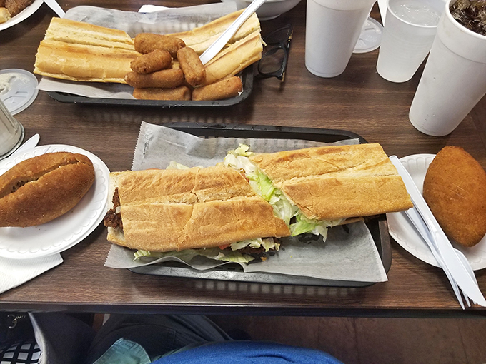 The Cuban sandwich that launched a thousand food comas. Layer upon layer of flavor, it's like a tasty game of Jenga you can eat. Photo credit: Manolo Hernandez