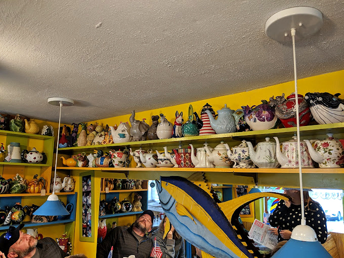 It's like your eccentric aunt's china cabinet exploded... in the best way possible. Every teapot tells a story, and every shelf is a treasure trove.