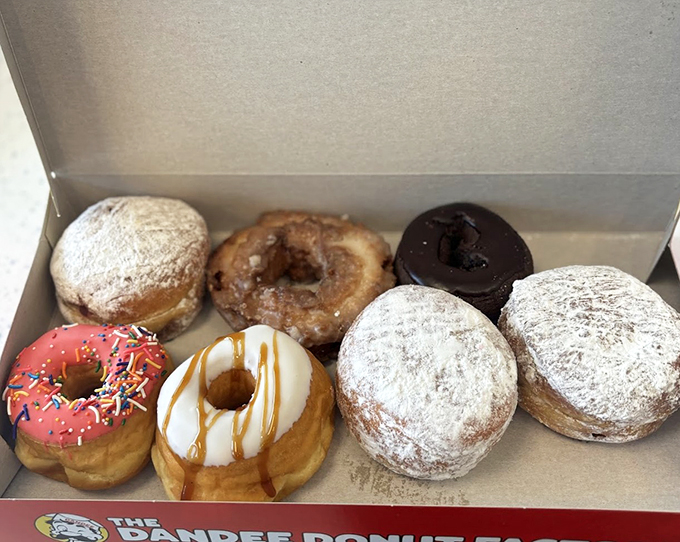 A box of joy, sprinkled with happiness. These donuts are like the Avengers of the pastry world - each with its own superpower.