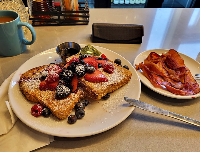 French toast that's dressed to impress! This berry-laden beauty is what happens when breakfast decides to throw on its Sunday best. It's a sweet symphony in every bite.