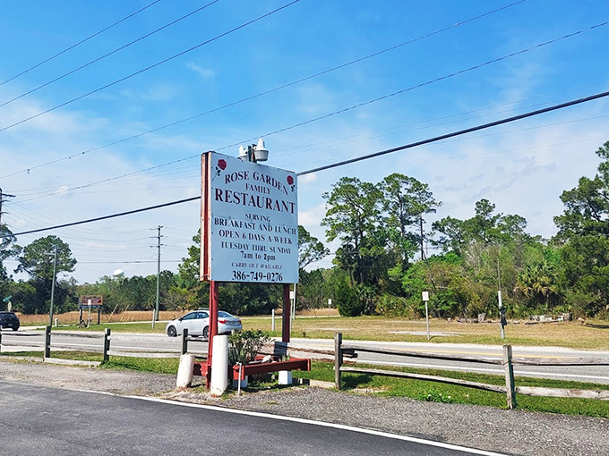 No fancy neon here, folks! Just a simple sign promising good eats and small-town charm in equal measure.