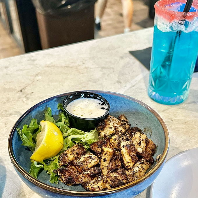 Grouper nuggets: the grown-up version of fish sticks we never knew we needed. Golden, crispy, and addictive – resistance is futile! Photo credit: Brooke H.