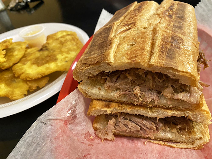 Move over, pulled pork - mojo pork is here to steal the show. This sandwich is a flavor fiesta waiting to happen. Photo credit: Maria D.