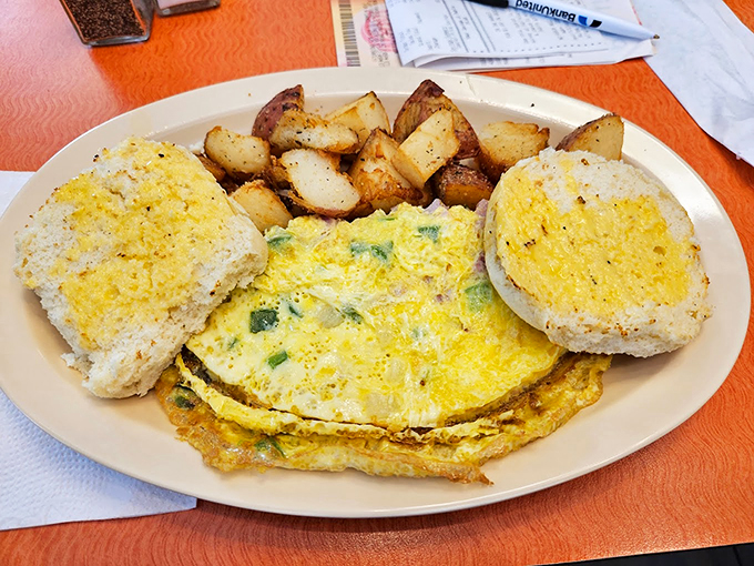 This omelet is so fluffy, it might float away if not for its delicious veggie anchors. It's like a cloud decided to become breakfast.