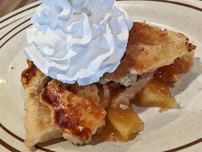 Meet the apple pie that puts clouds of whipped cream to shame. Golden, flaky, and ready for its close-up on the dessert runway.