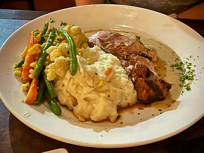 Pork Diane, oh my! This dish is so beautifully plated, it's almost too pretty to eat. Almost. Photo credit: Bob N.