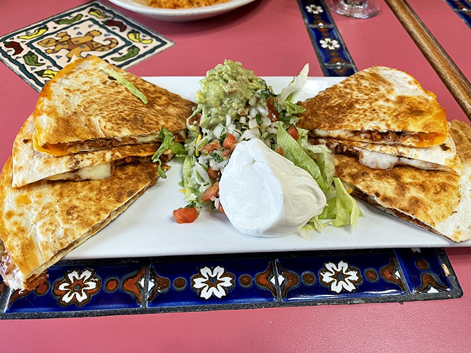 Quesadillas: Where cheese dreams come true. These golden triangles of joy are like a warm, gooey hug for your mouth.