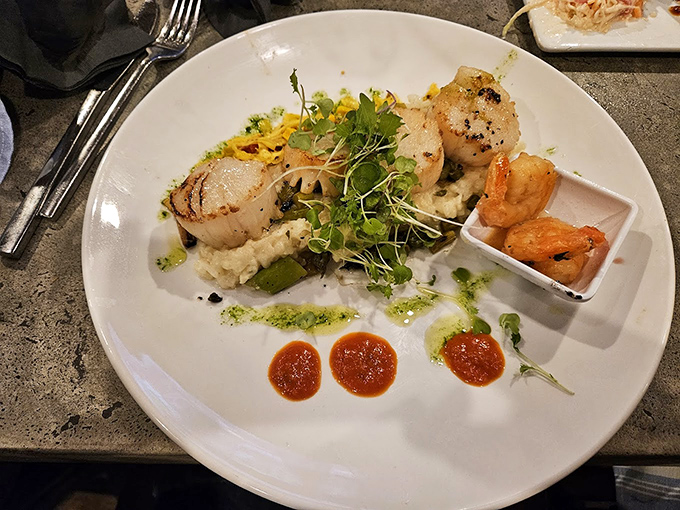 Sea-to-plate perfection: these scallops are so fresh, they might just swim off your fork. A work of art that's almost too pretty to eat. Almost.