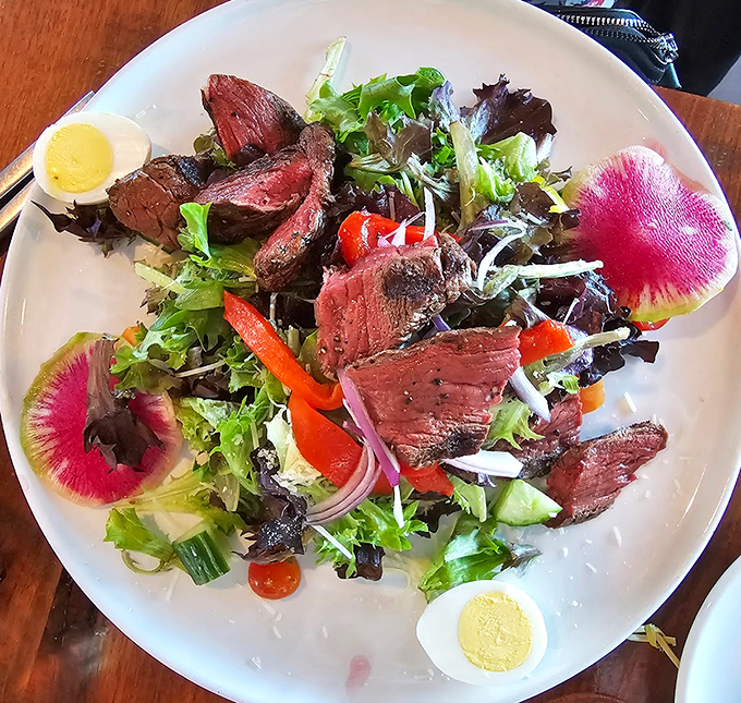 Who said salads were boring? This steak salad is like a garden party where the cow crashed in style. Photo credit: Patricia Gray