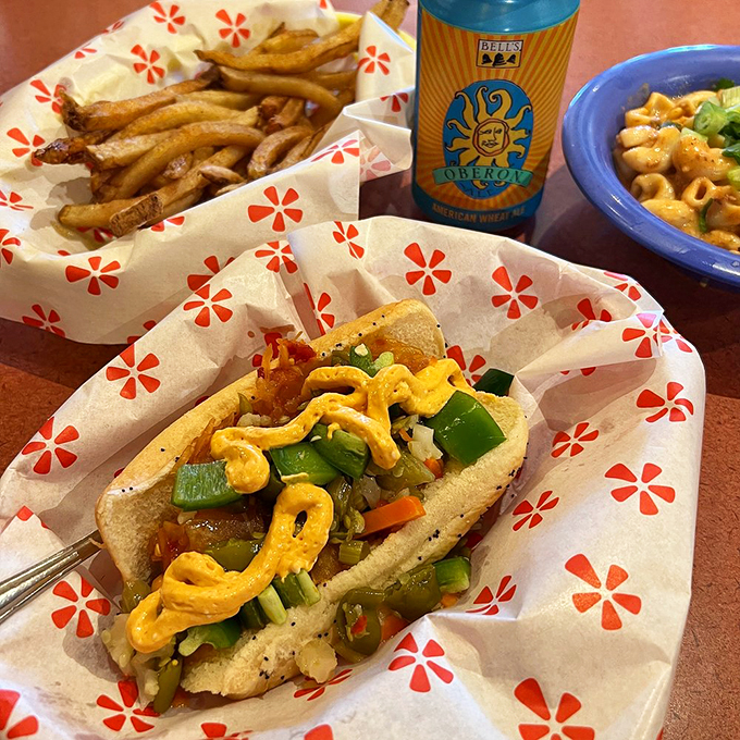 Holy hot dog heaven! This loaded veggie dog is like a garden party in a bun. Crisp peppers, zesty sauce, and a perfectly grilled frank &ndash; it's a flavor fiesta that'll make your taste buds do the cha-cha.