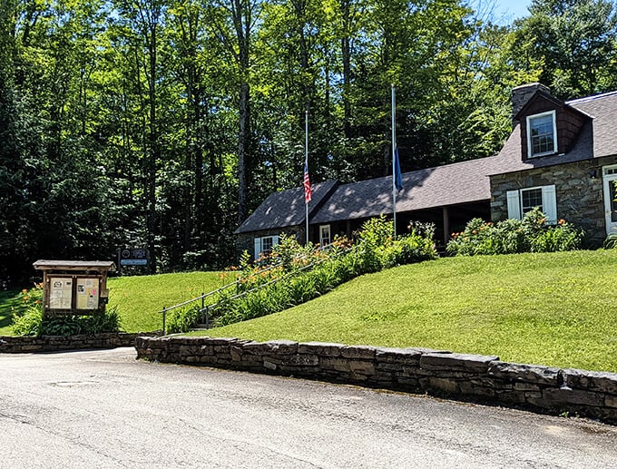 Park HQ or cozy mountain retreat? This charming building nestled in the woods is giving serious "Walden Pond meets Parks and Rec" vibes.