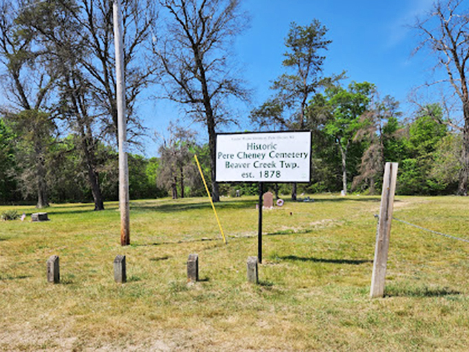 Pere Cheney's tilting headstones: History's game of dominos. Each marker a chapter in a town's ill-fated story. Photo credit: Travel the Mitten