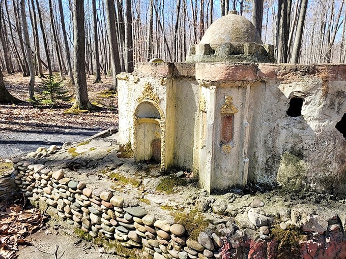 Like a miniature fairy tale castle in the Wisconsin woods, this stone-studded shrine whispers stories of folk art passion and patient craftsmanship.