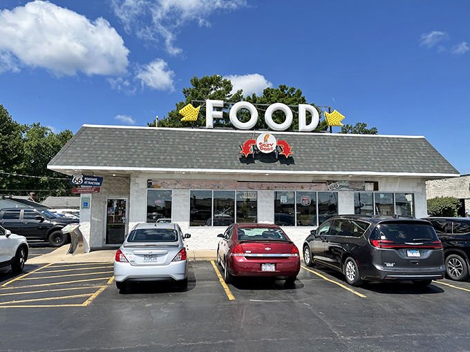 Get your kicks (and corn dogs) on Route 66! The Cazy Dog's retro sign is your gateway to deep-fried bliss.