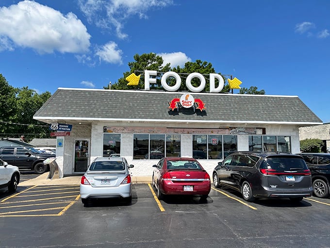 Get your kicks (and corn dogs) on Route 66! The Cazy Dog's retro sign is your gateway to deep-fried bliss.