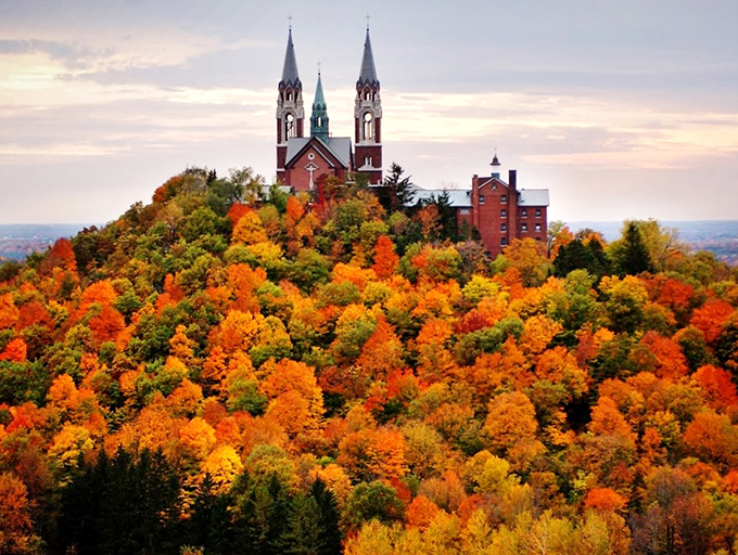 Talk about a stairway to heaven! This Gothic Revival gem stands tall amidst a sea of autumn colors.