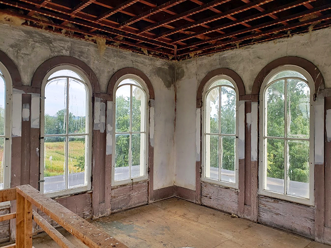 Who says you can't take it with you? This mansion's ghostly residents seem determined to stick around for an eternal house party.