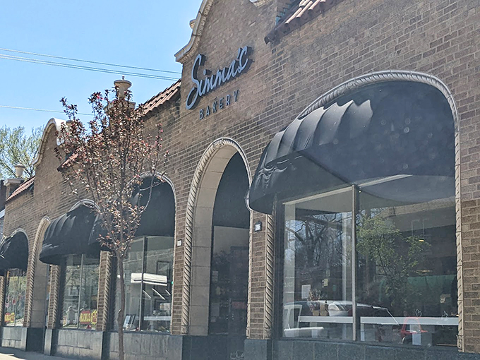 Where brick facades hide sweet secrets. It's like Fort Knox, but instead of gold, they're guarding the holy grail of cheesecakes! Photo credit: Paul Runnoe