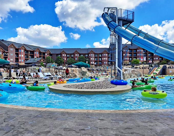 The outdoor pool area transforms into a sunset oasis, with palm-roofed cabanas providing perfect relaxation spots.