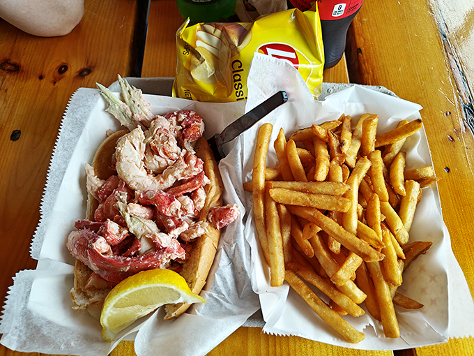 The classic Maine duo: lobster roll meets crispy fries. It's comfort food that hugs your taste buds and your soul.