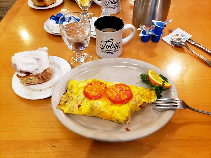 Eggs-cellent choice! This omelet is fluffier than a cloud and packed with more goodies than Santa's sleigh.