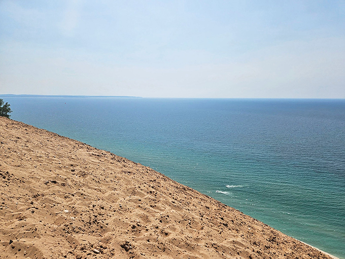 Sand meets sky in a Great Lakes spectacle! This view is so vast, you'll swear you can see the curvature of the Earth.