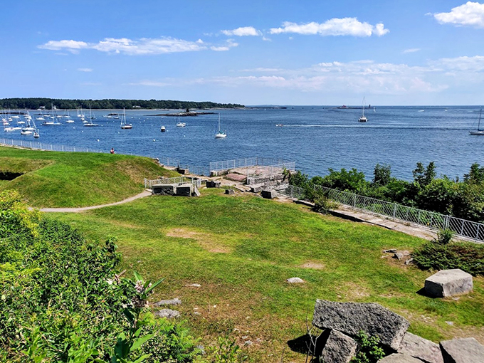 A sailor's paradise: The sparkling waters beyond Fort McClary host a ballet of sailboats, their white sails dancing on the breeze.