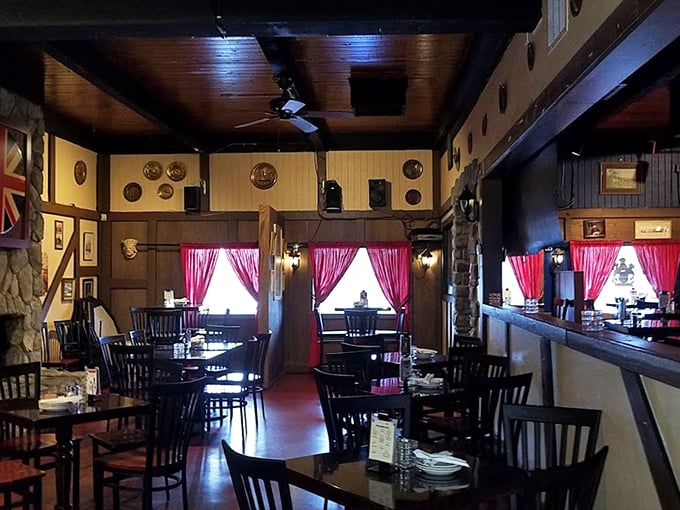 Red curtains and dark wood: the universal language of "cozy pub." Time to settle in for a long night of good cheer.