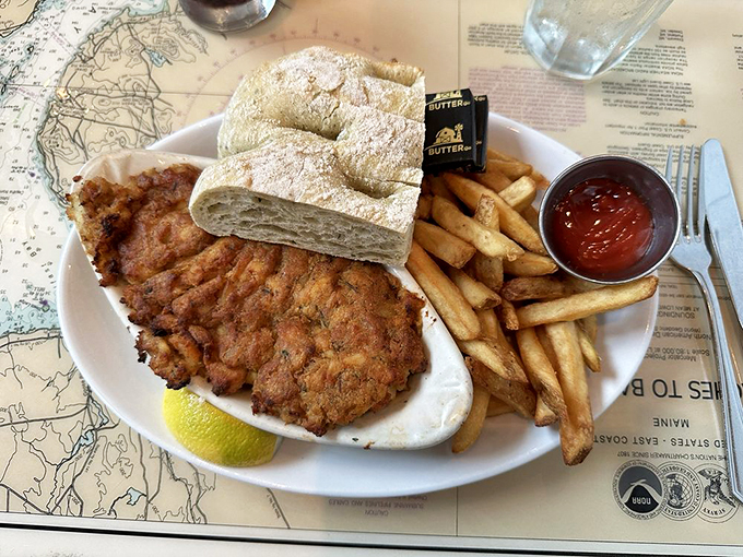 Beer-battered haddock that's crispy enough to make angels sing, served with fries that are clearly on a first-name basis with perfection. Photo credit: Emma F.