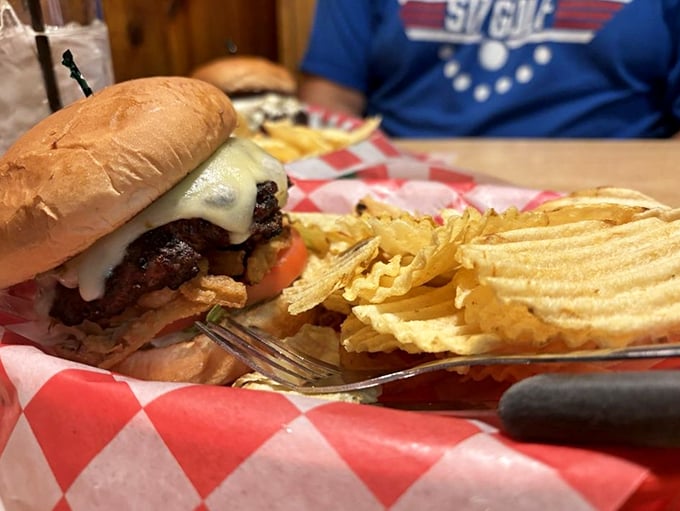 This hand-pressed burger with melted cheese tells you everything you need to know about happiness between two buns.