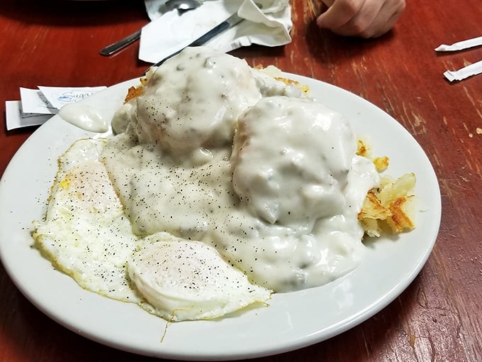 Biscuits and gravy: the comfort food that hugs you from the inside. This plate looks like it could cure everything from a broken heart to a stubborn hangover.