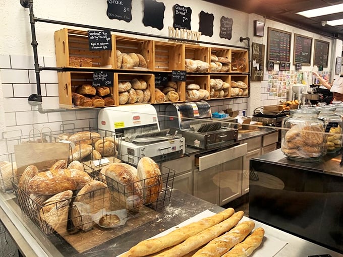 Wooden crates filled with fresh-baked loaves create an artisanal gallery where carbs are definitely works of art.