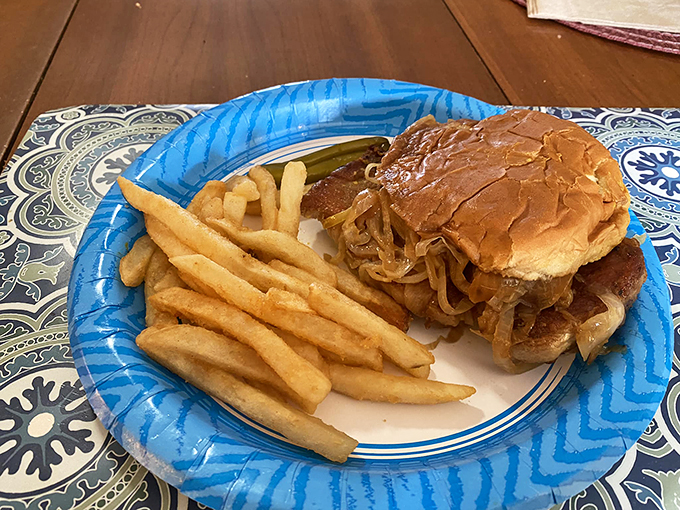 Golden fries and a perfectly grilled sandwich on a classic blue plate—some things never need changing.