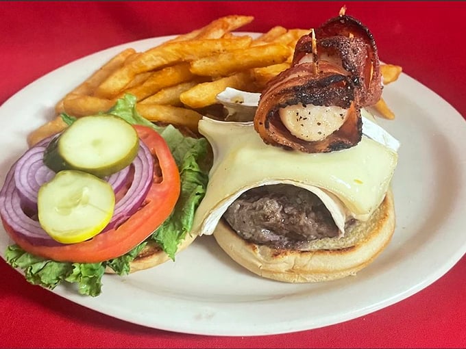 Surf meets turf in this scallop-topped burger. It's like The Odd Couple, but delicious and without the bickering.