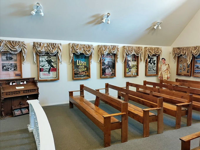 Simple wooden pews and vintage movie posters create an atmosphere where Hollywood's Golden Age meets desert spirituality.